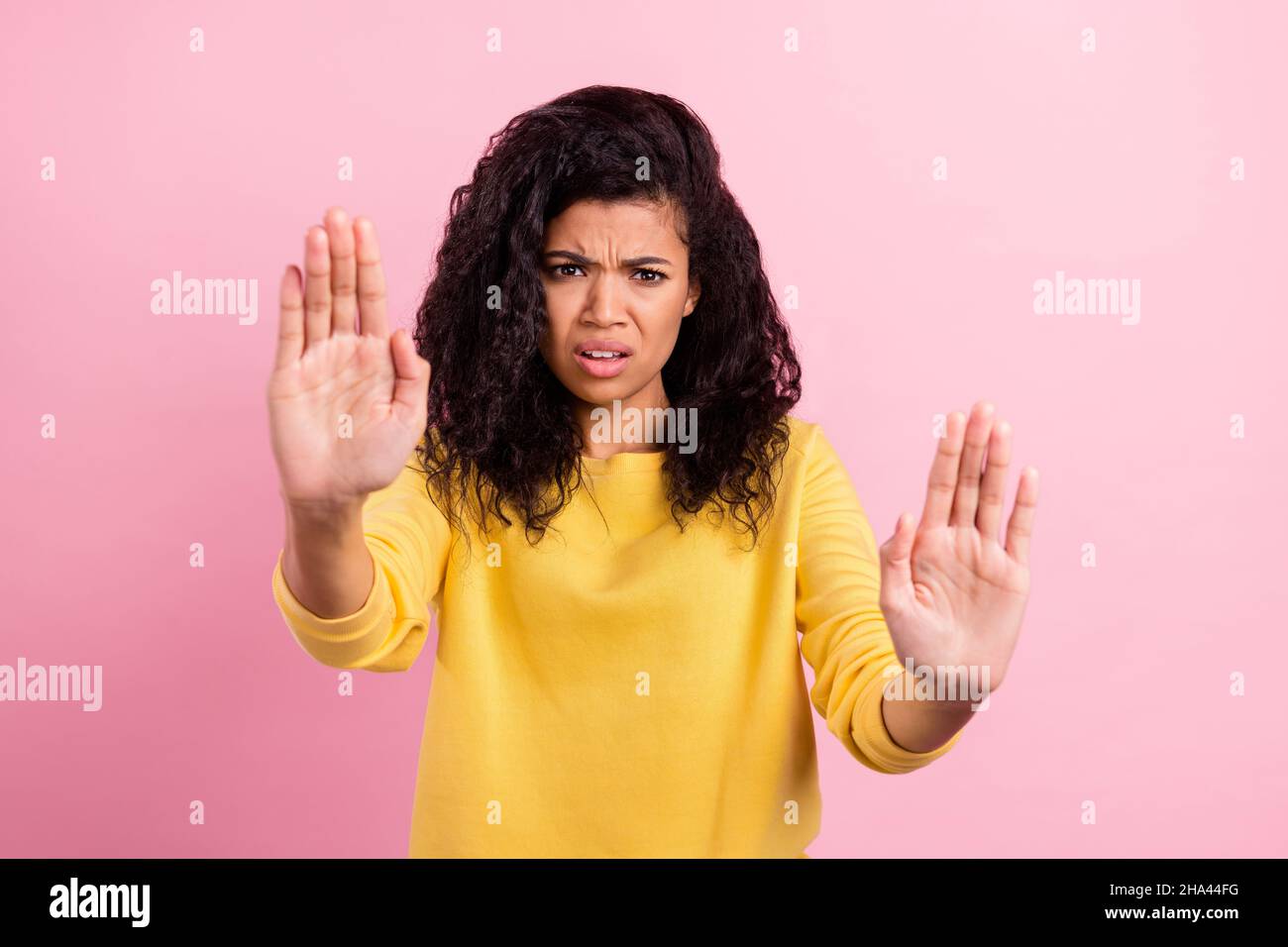 Photo of young afro girl unhappy upset show hands refuse decline avoid ...