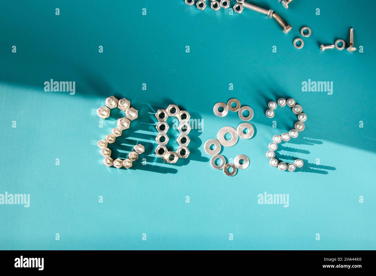 2022 New year numbers with bolts and nuts, building materials numbers ...