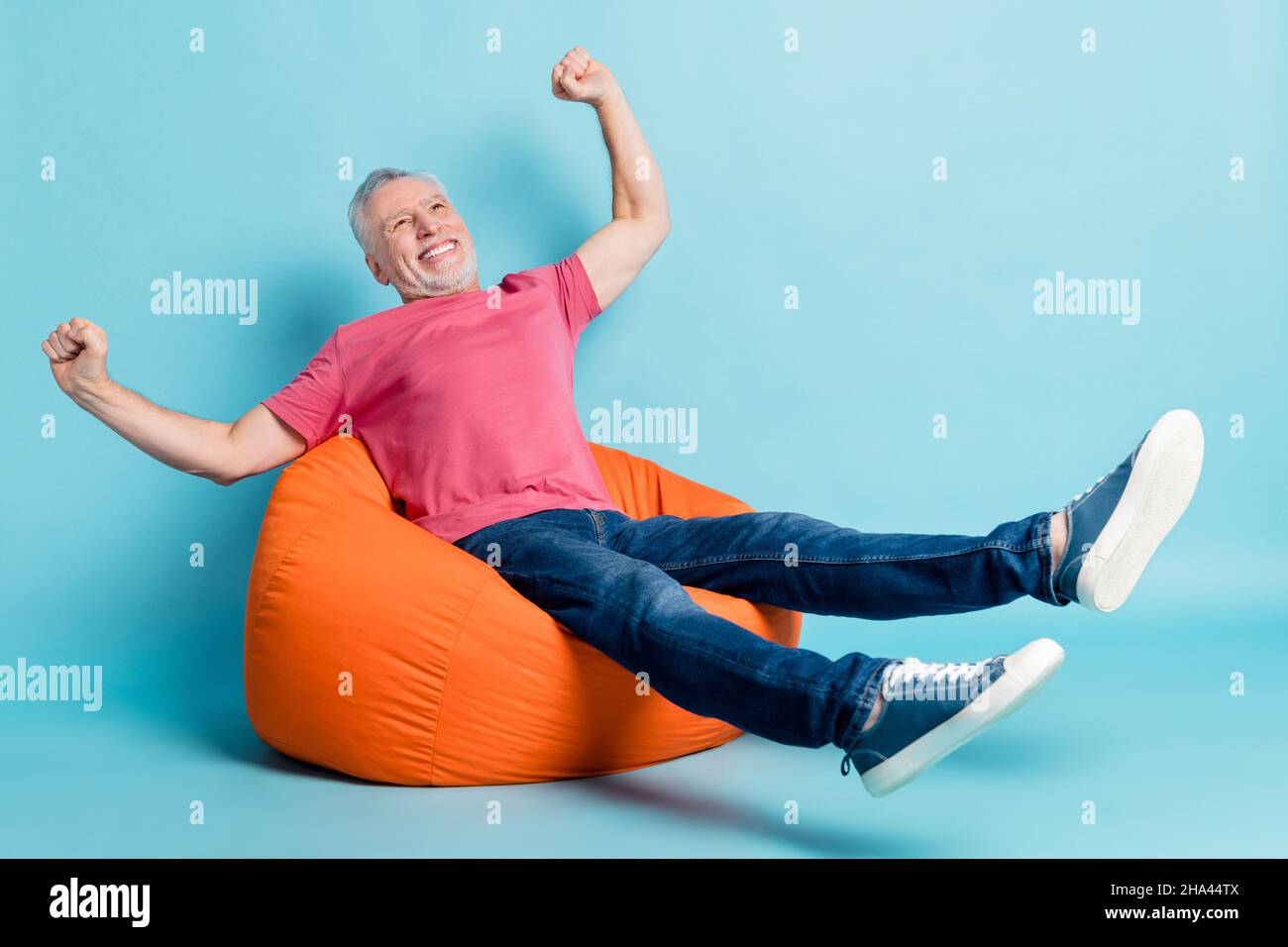 Full length body size view of attractive glad cheerful man sitting in ...