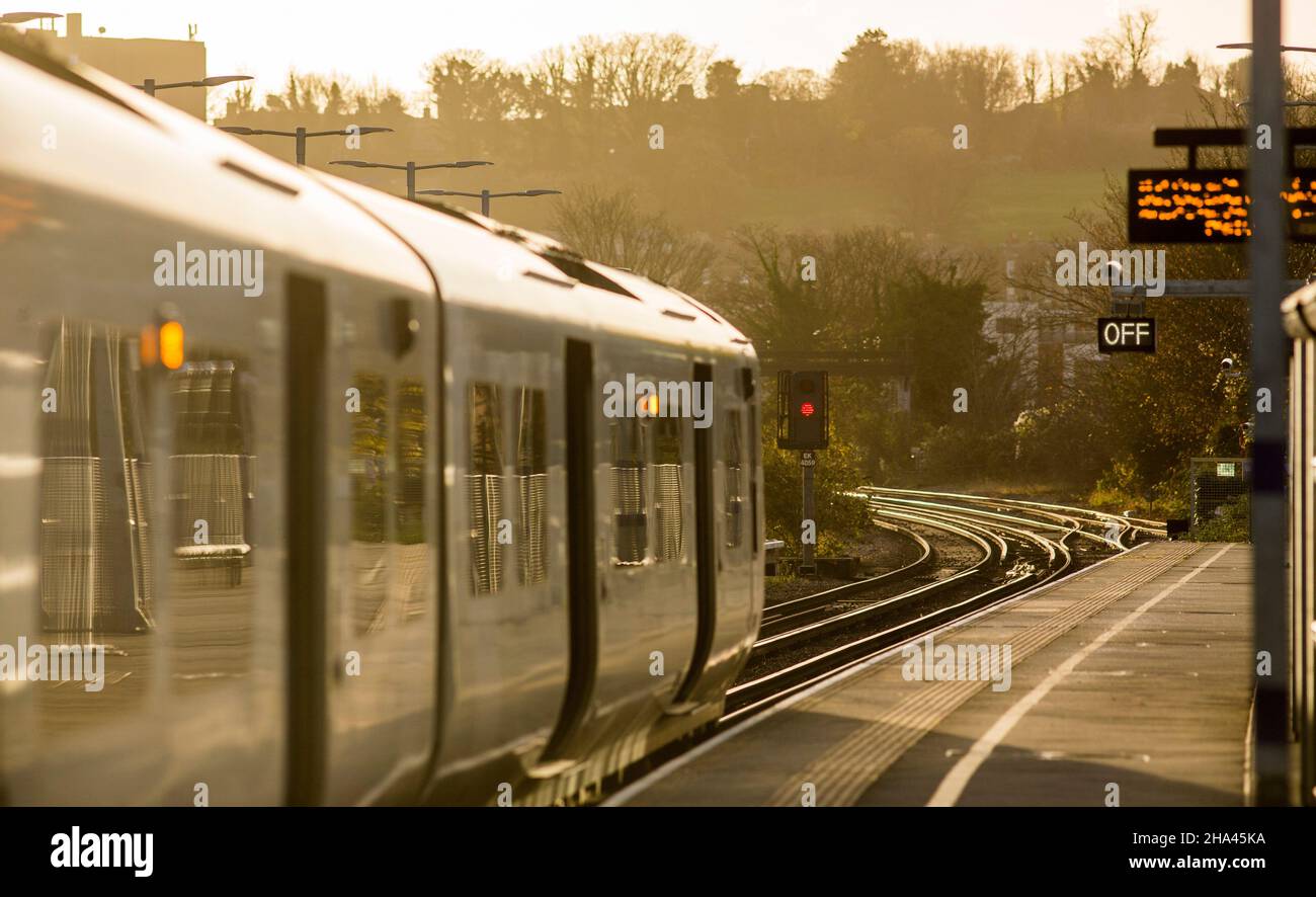 A Thameslink train passes through Rochester railway station in Kent ...