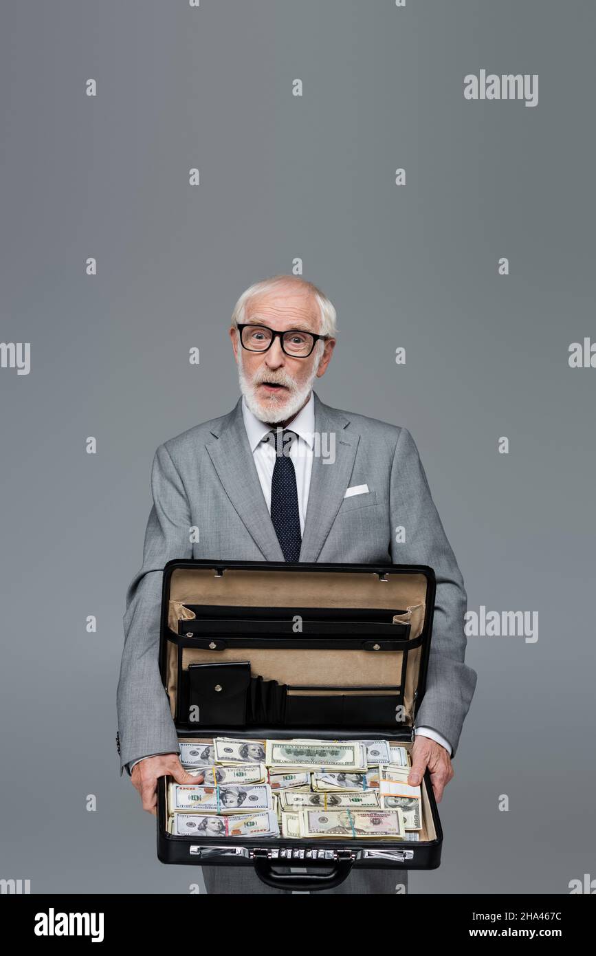 Briefcase full american dollars money hi-res stock photography and ...