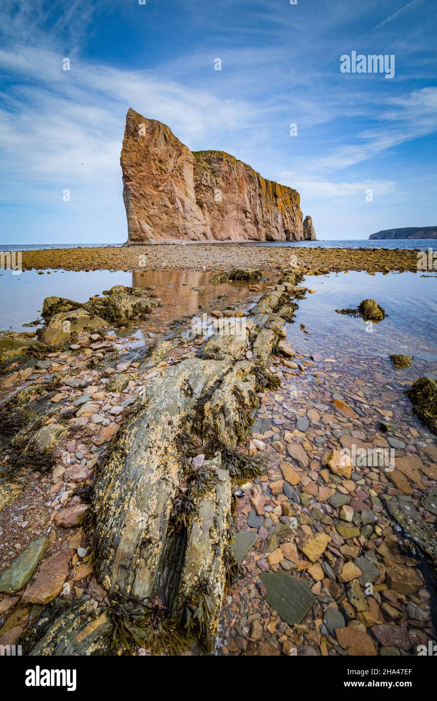 Close up on the famous Percé rock at low tide, Percé town, Gaspesie ...
