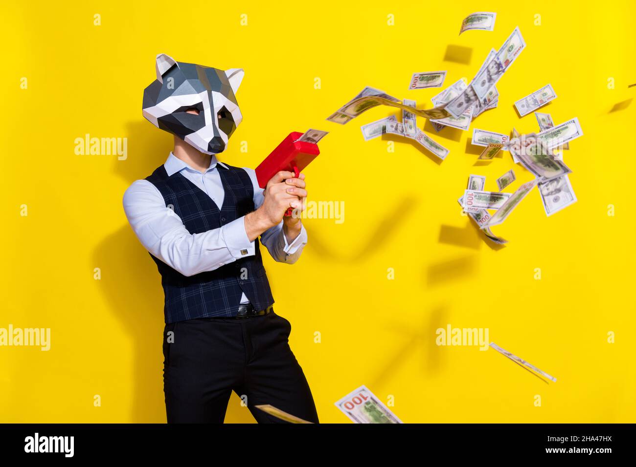Photo of bizarre freak guy banker racoon mask shoot pistol salary money ...