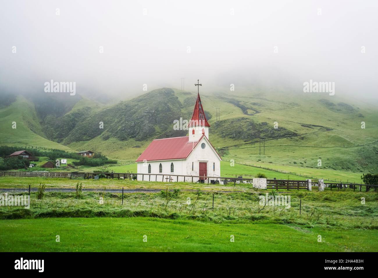 typical rural icelandic church with red roof in vik region of iceland ...