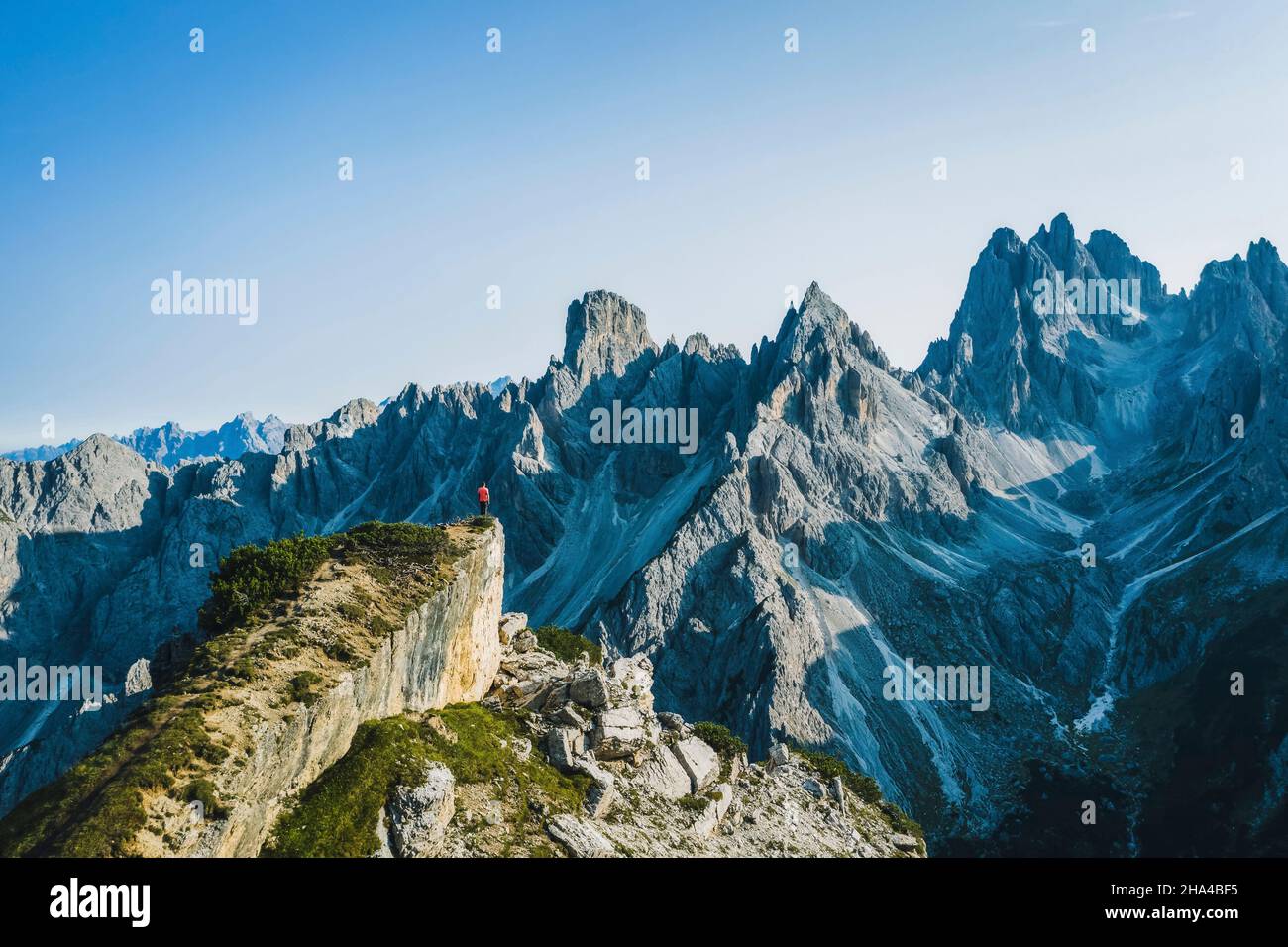 A Panoramic Aerial View Of A Man On The Top Enjoying Epic Cadini Di
