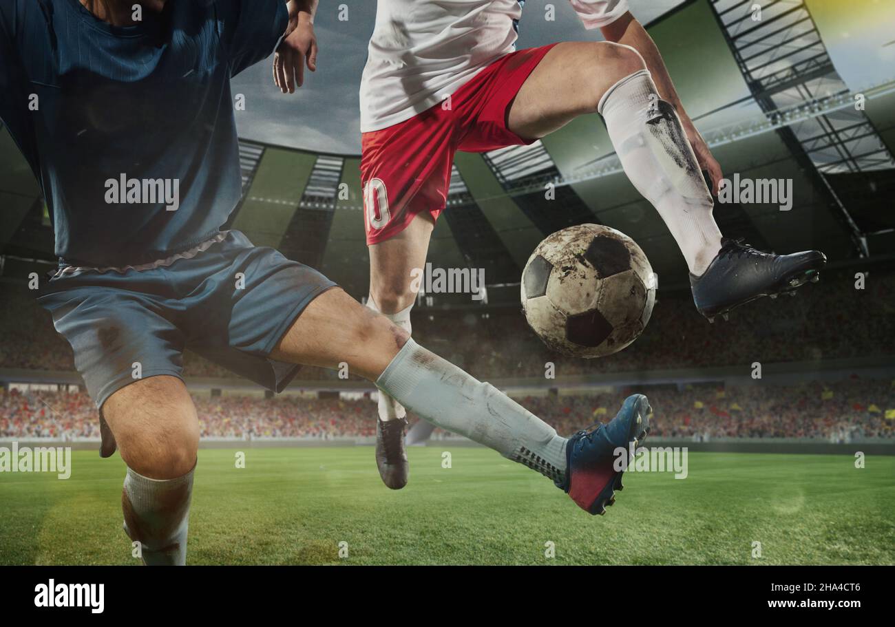 Cropped image of sportive men, male soccer, football players playing ...