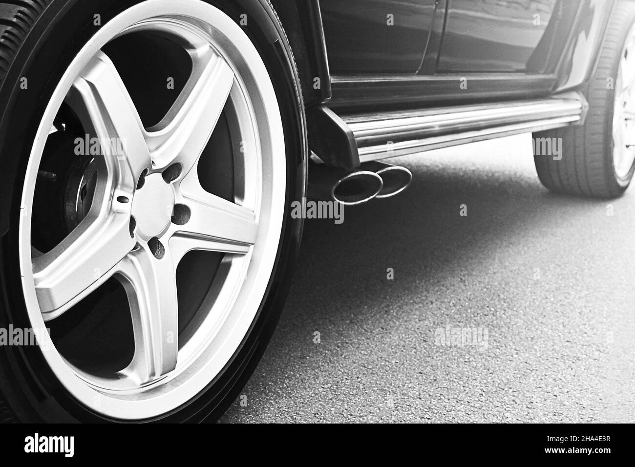 Car wheels close up on a background of asphalt. Car tires. Car wheel ...
