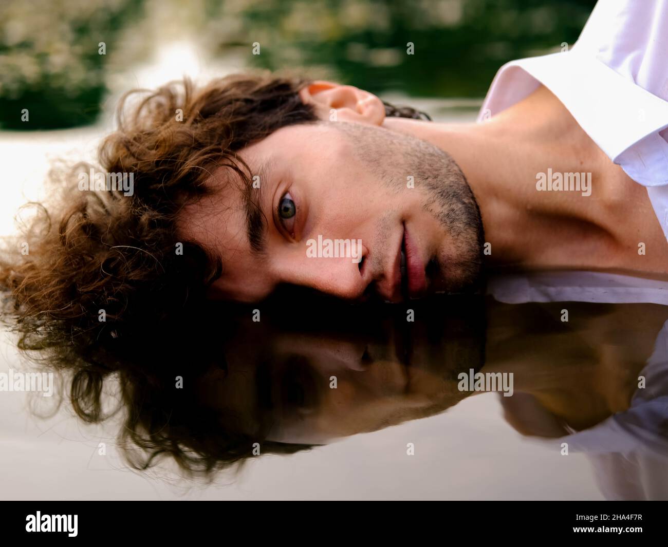 Avgust portrait of man in the water 1 Stock Photo - Alamy