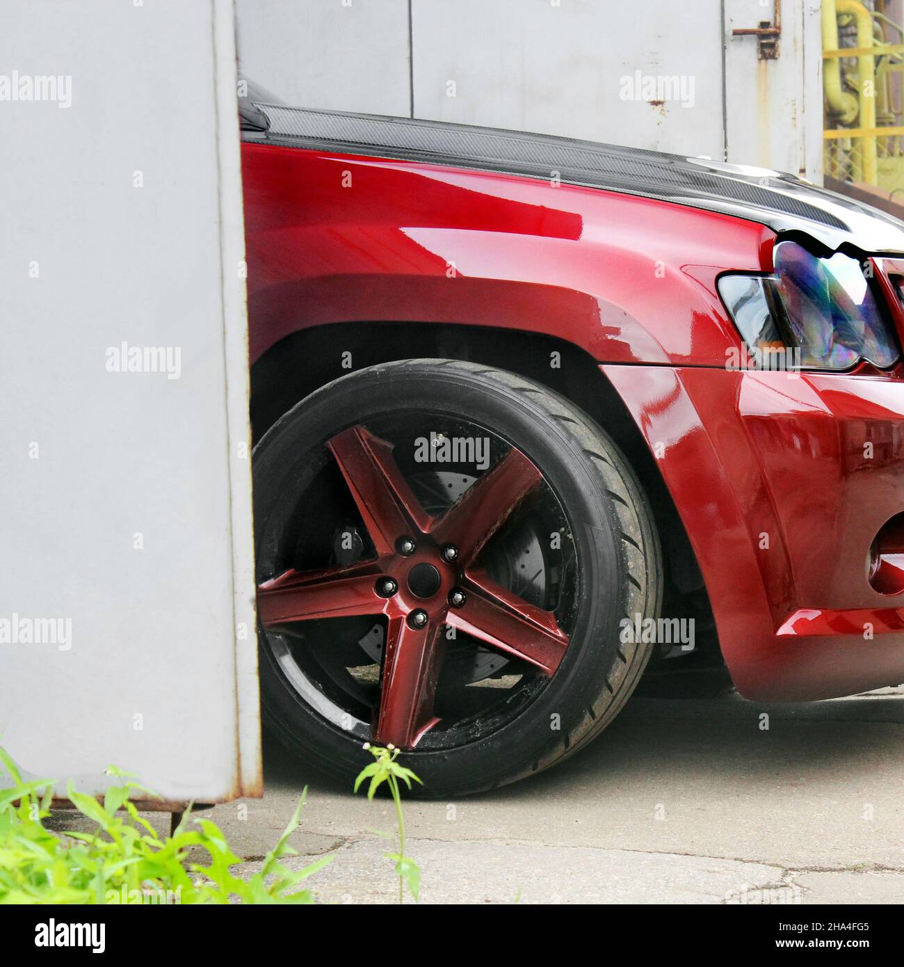 Part of luxury red car Stock Photo - Alamy