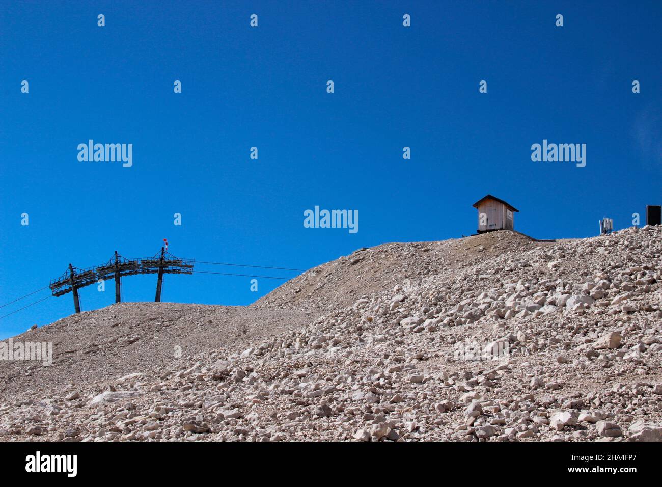 ski masts and ski hut during hike to zugspitze 2962 m,scree field ...