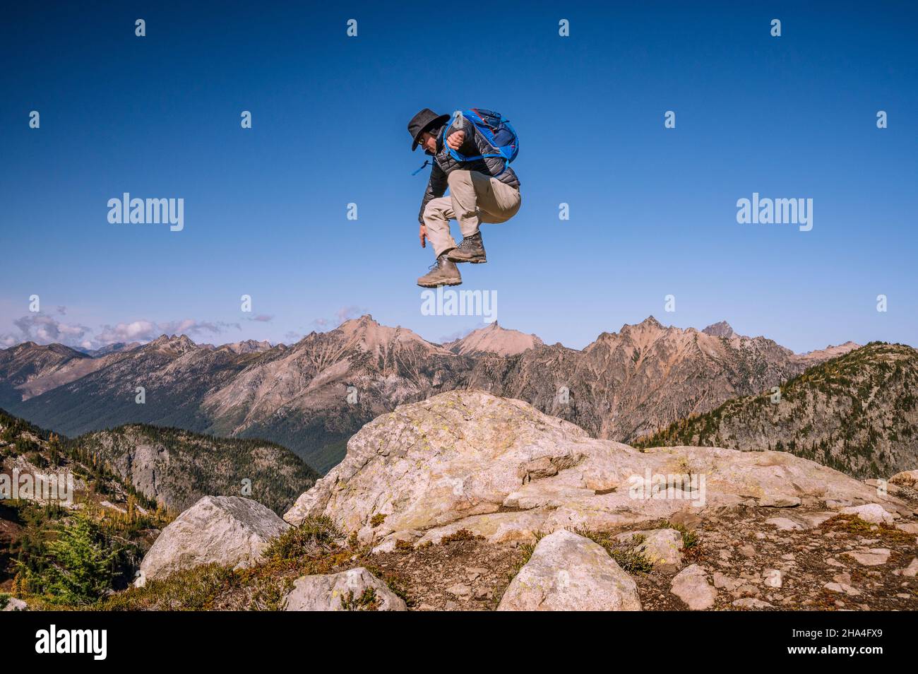 Person jumping hi-res stock photography and images - Alamy