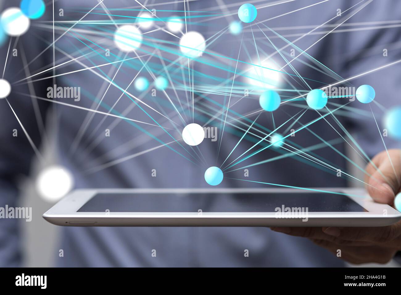 3D rendering of digital connections floating on a businessman's tablet ...