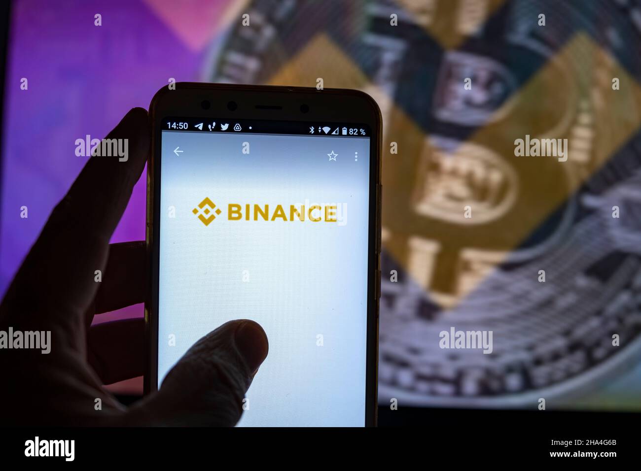 In this photo illustration the Binance logo is seen on the screen of a ...