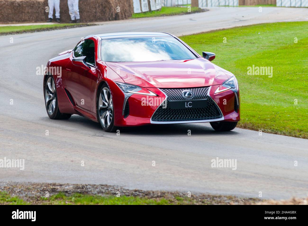 Lexus LC grand tourer car driving up the hill climb track at the ...
