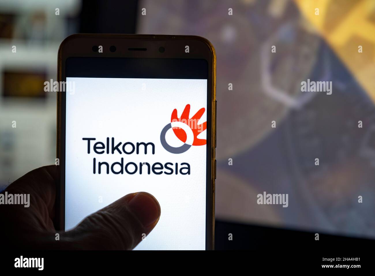 In this photo illustration the Telkom Indonesia logo is seen on the ...