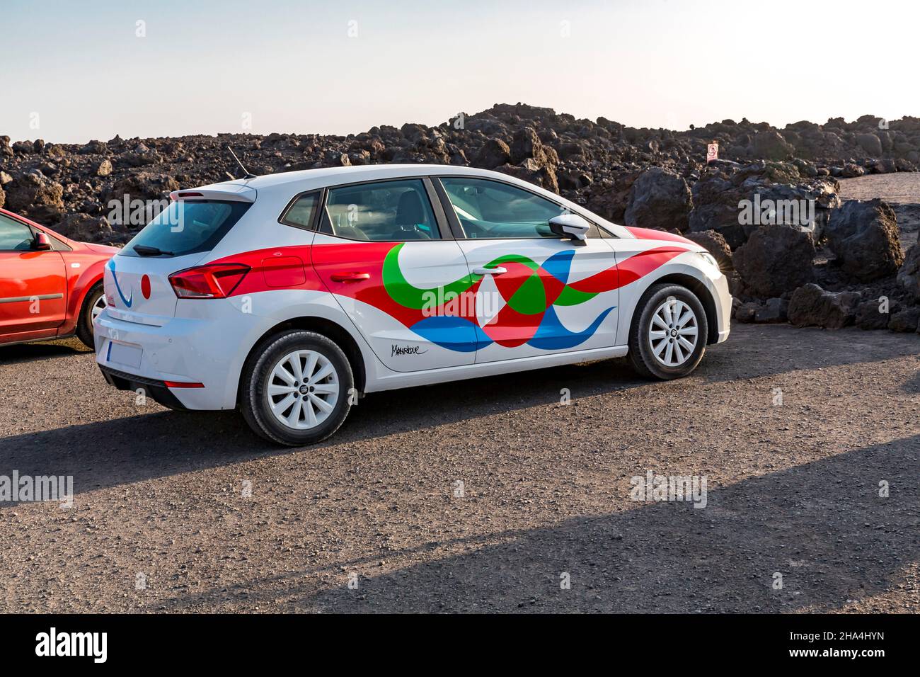 Car brightly painted according to the motifs of cesar manrique hi-res ...