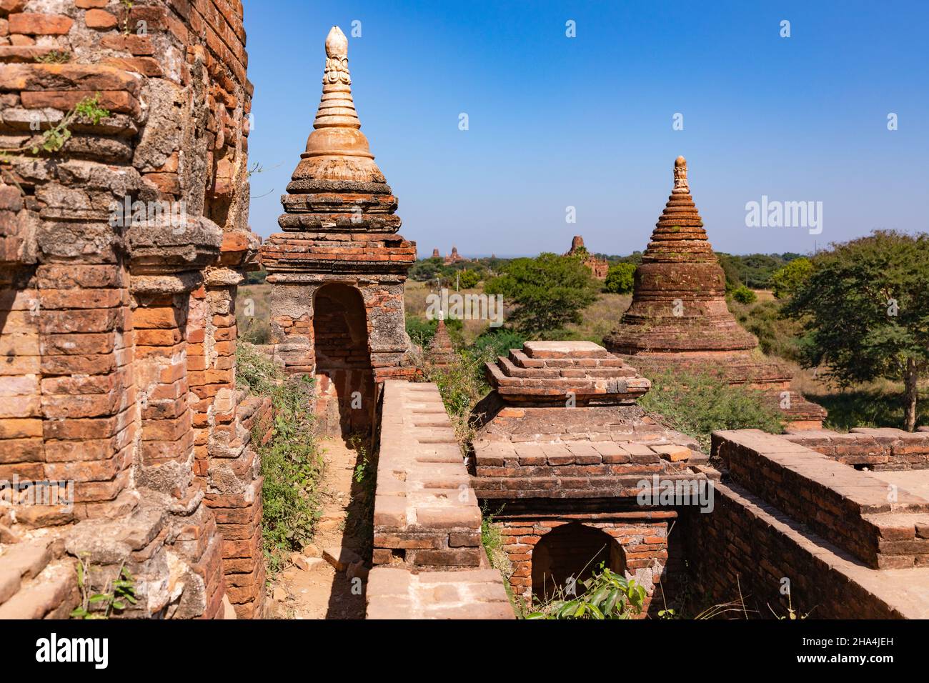 Individual stupas decorate a building of the historical temple complex ...