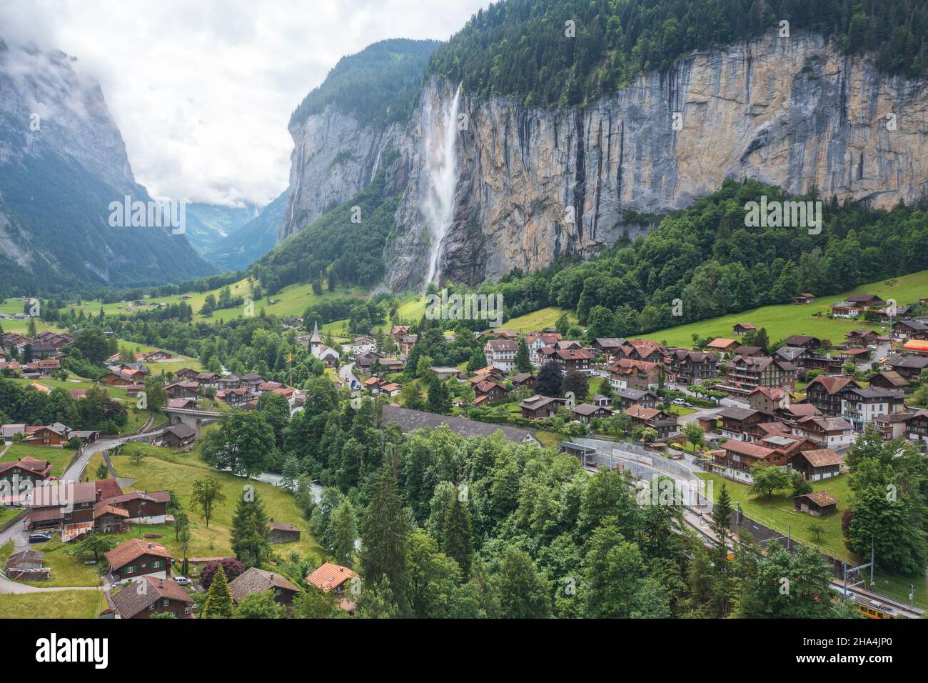 swiss valley with waterfall from aerial view Stock Photo - Alamy