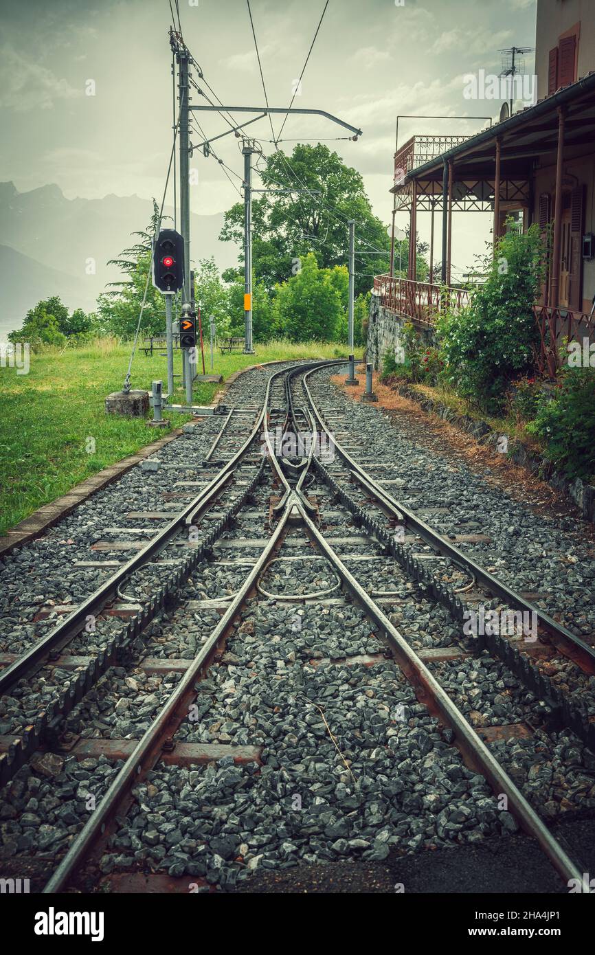 old rails in old train station Stock Photo - Alamy