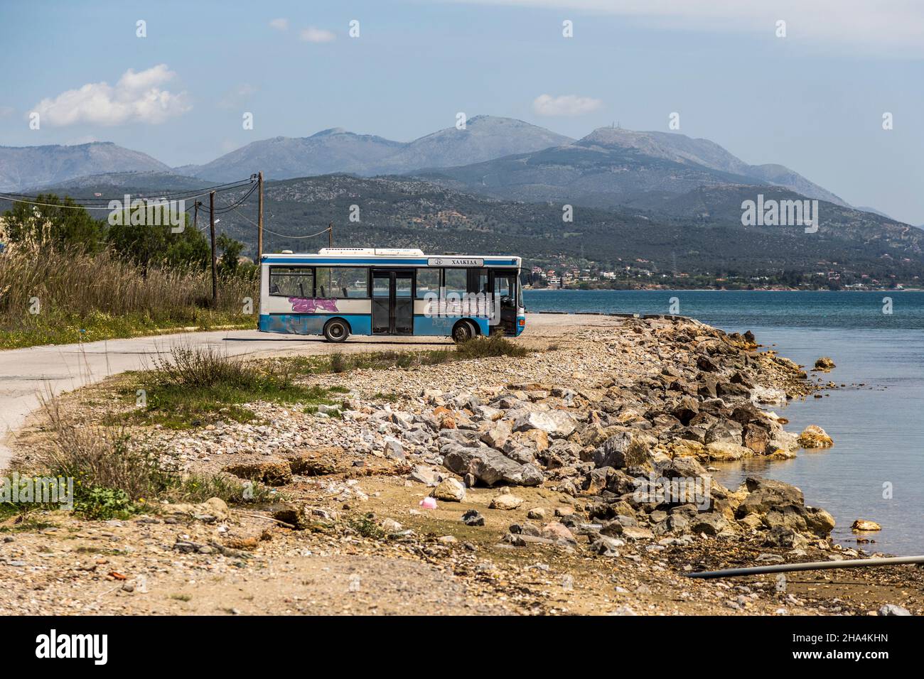 a public bus doing a turn Stock Photo - Alamy