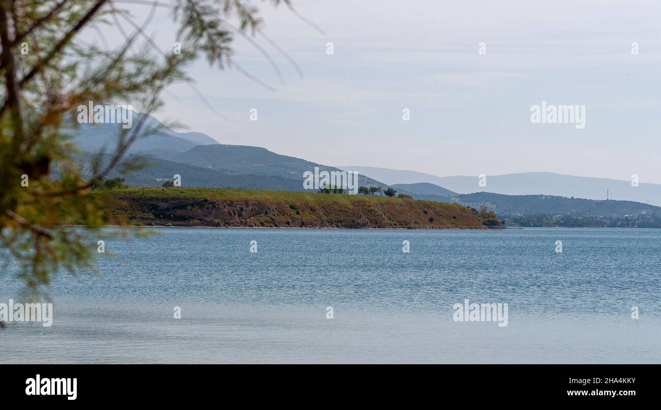 blue ocean,land and mountains in the back surrounded by copyspace Stock ...