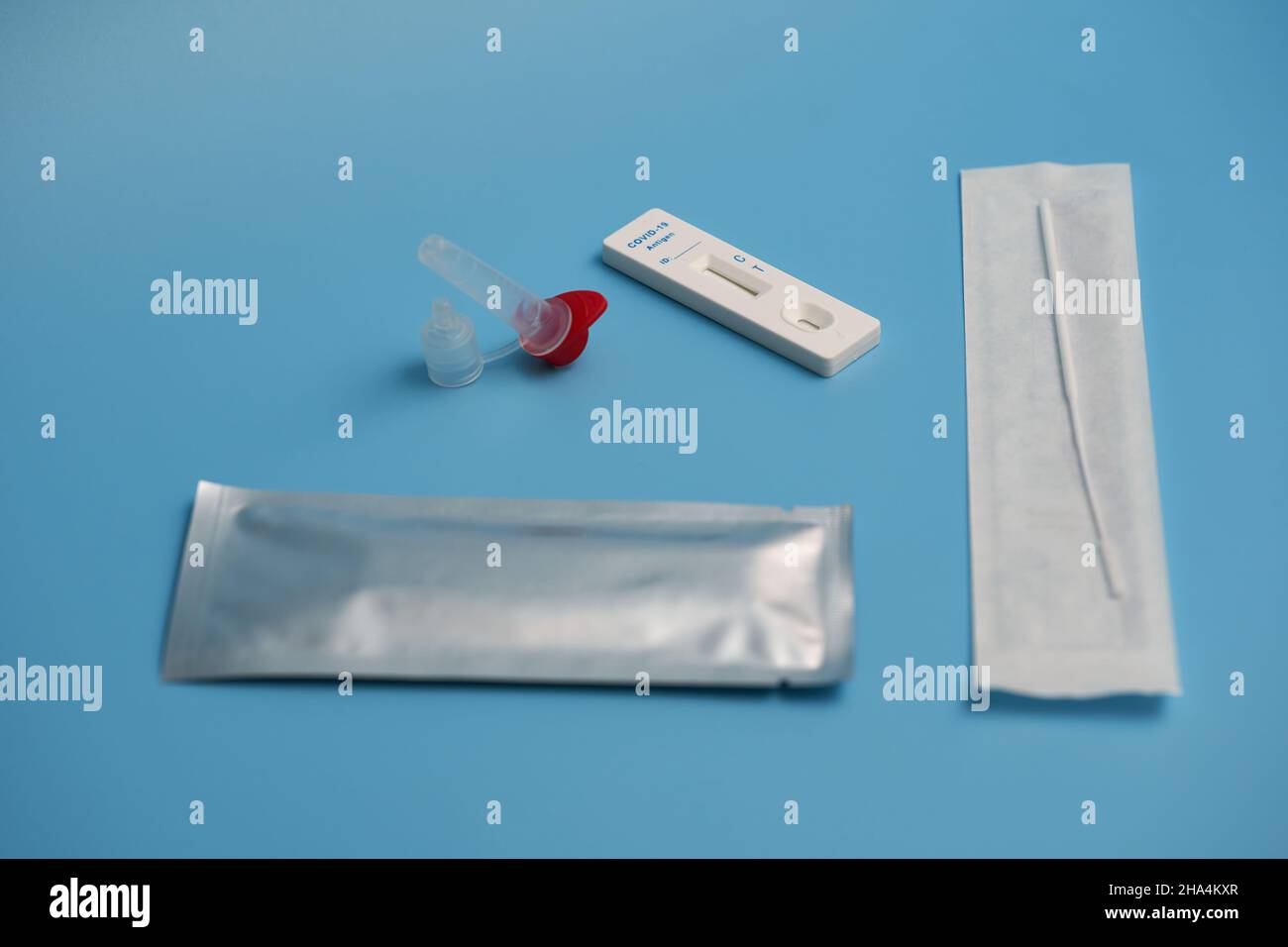 Antigen test also corona rapid test with test cassette, cotton swab and ...