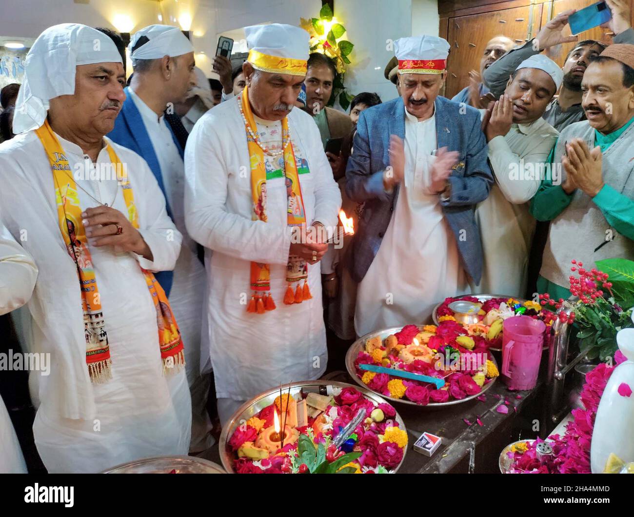 Hindu devotees from India are performing religious rituals during their ...