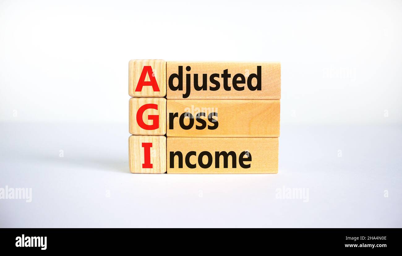 AGI adjusted gross income symbol. Concept words AGI adjusted gross ...