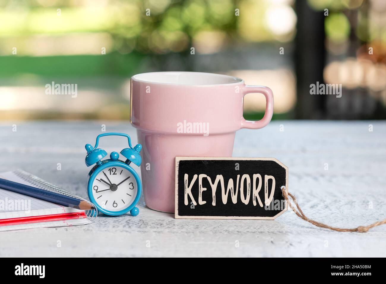 Hand writing sign Keyword. Word Written on word which acts as the key ...