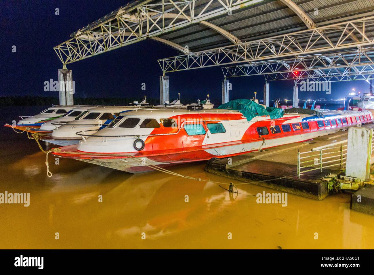 Night view of boats in a port of Sibu, Sarawak, Malaysia Stock Photo ...