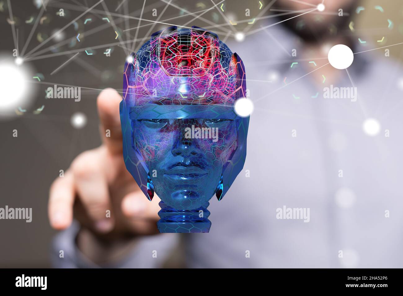 Computer engineer tapping on a hologram of a cyborg head and binary ...