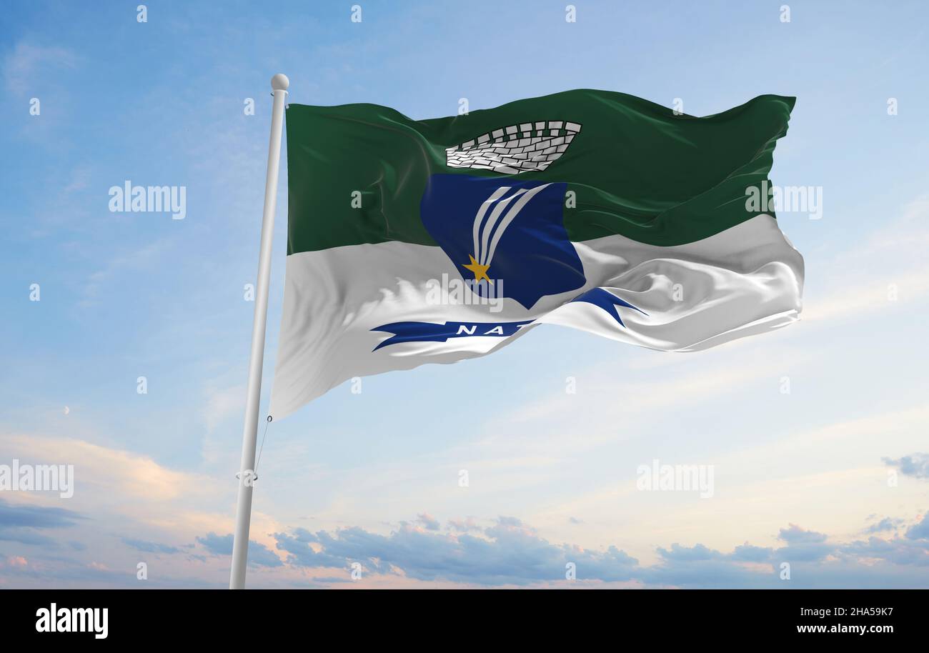 flag of Natal , Brazil at cloudy sky background on sunset, panoramic ...