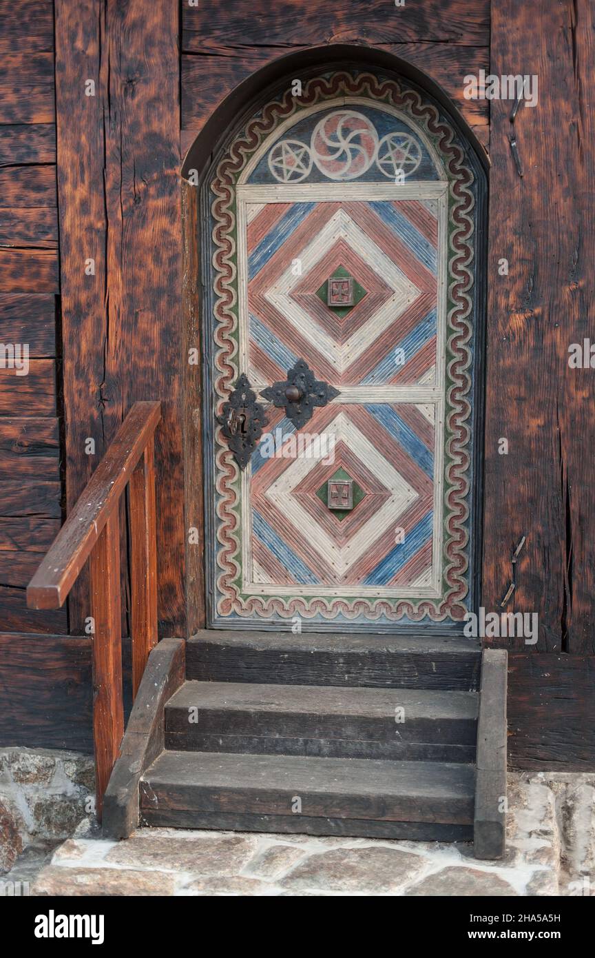 Detail view of old massive huge church wooden ancient door. Secret ...