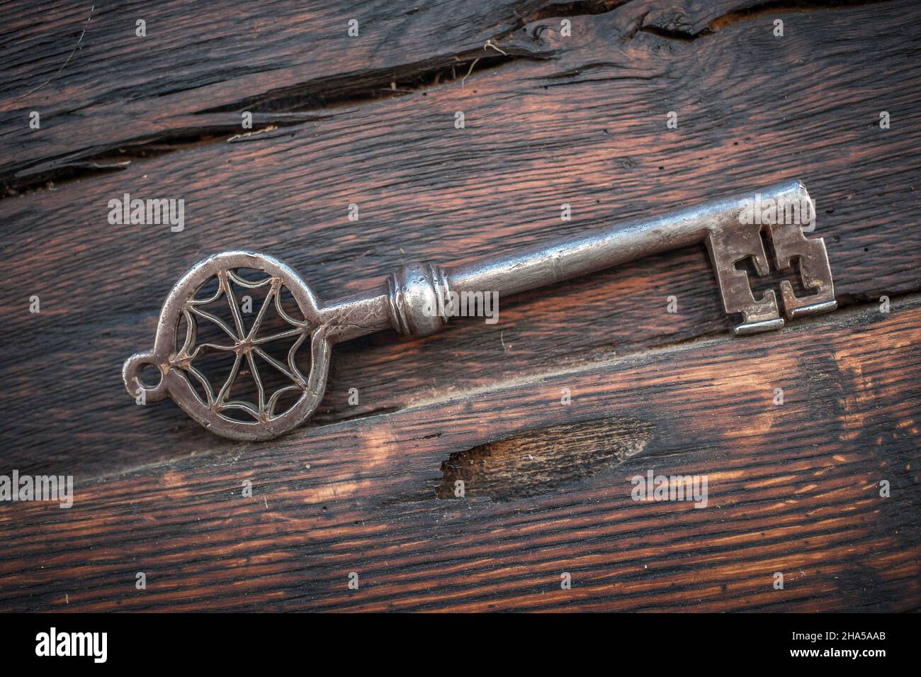 Closeup detail view of old large huge massive metal key for entrance ...