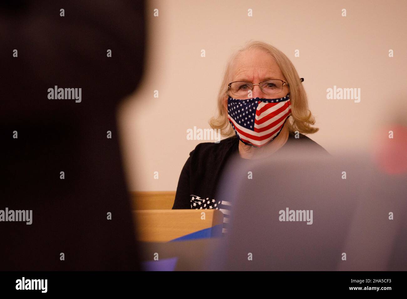 Portland, USA. 10th Dec, 2021. Alan Swinney's mother listens to ...
