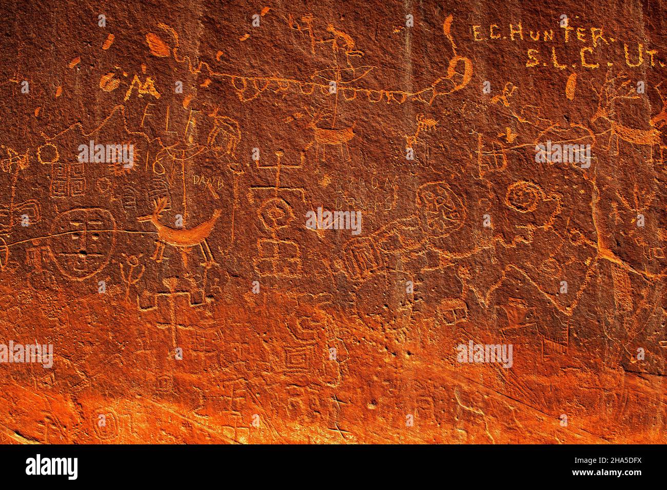 Petroglyphs carved into cliff wall on private property, Johnson Canyon ...
