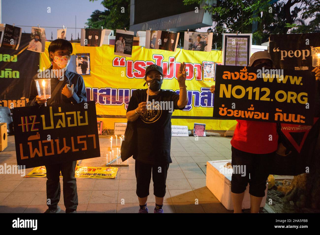(12/8/2021) Demonstrators lit candles for 112 minutes to demand the ...