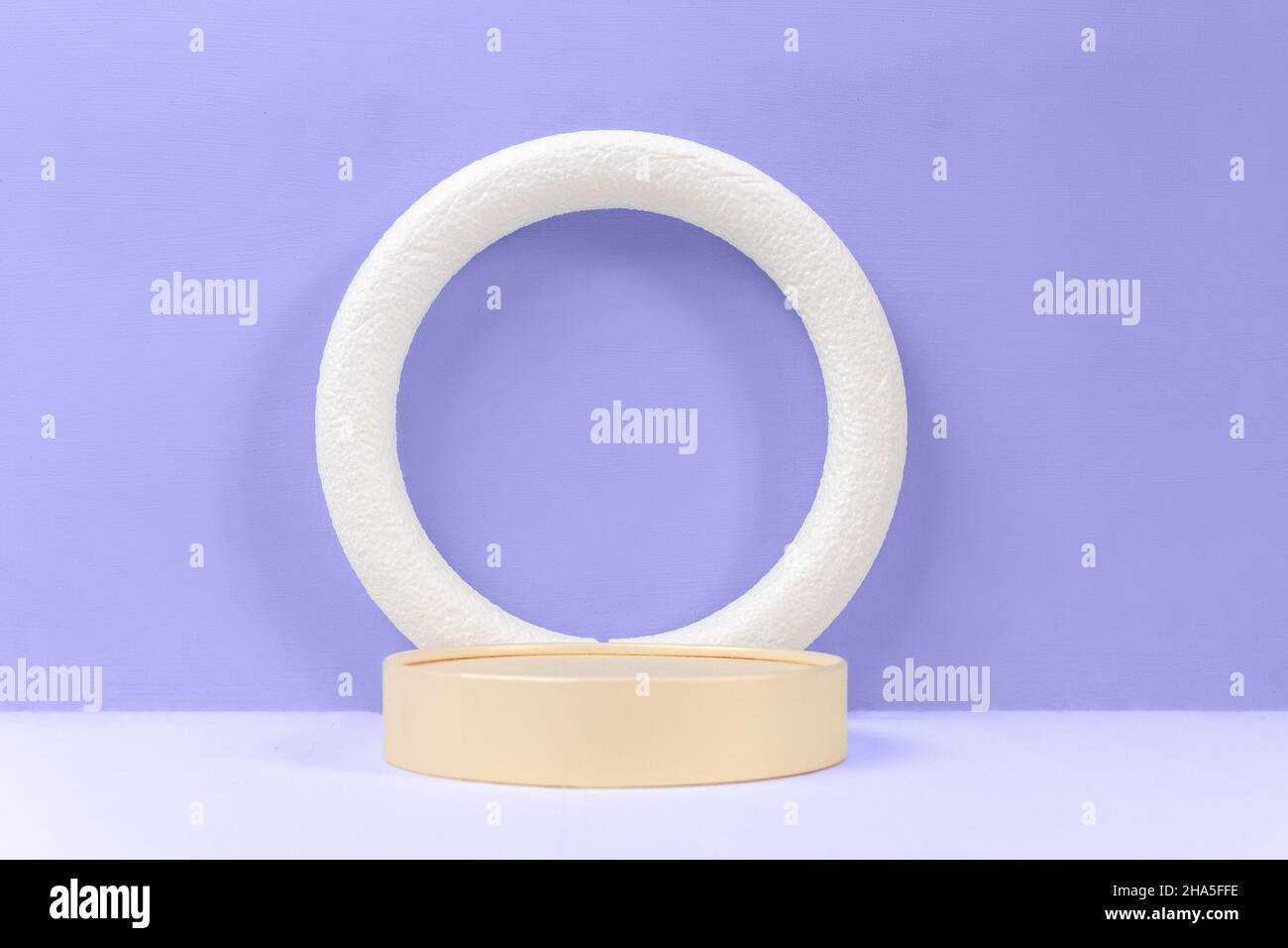 empty circle frame for object presentation or text against light purple ...
