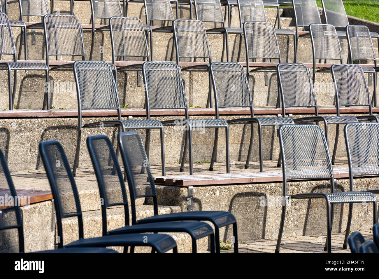empty chairs in front of a stage Stock Photo - Alamy