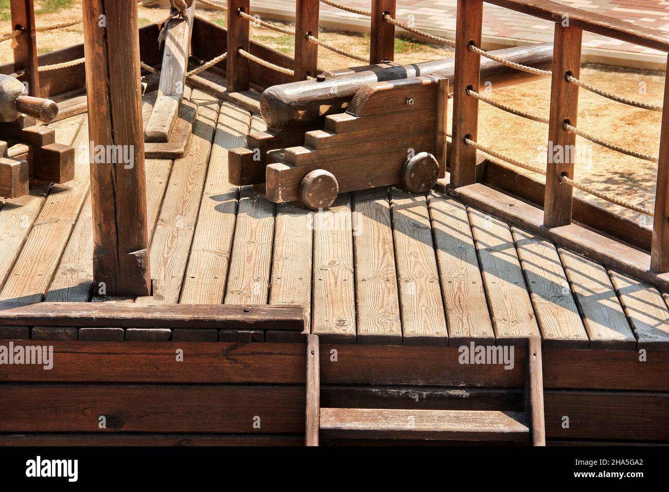 The old ship. Part of a wooden ship. Weapons on a ship Stock Photo - Alamy