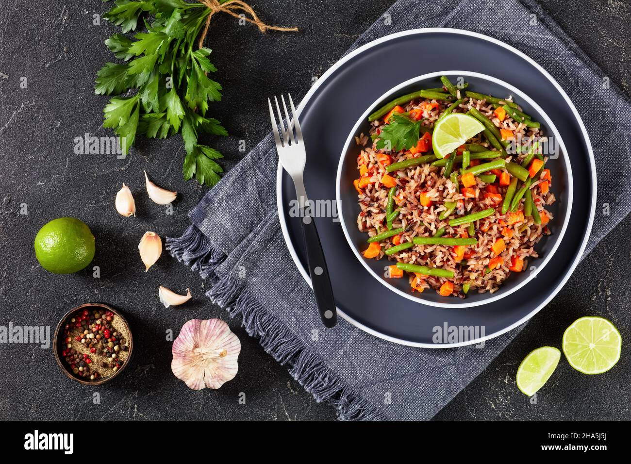 vegetarian pilaf of brown and wild rice with green beans and carrot on ...