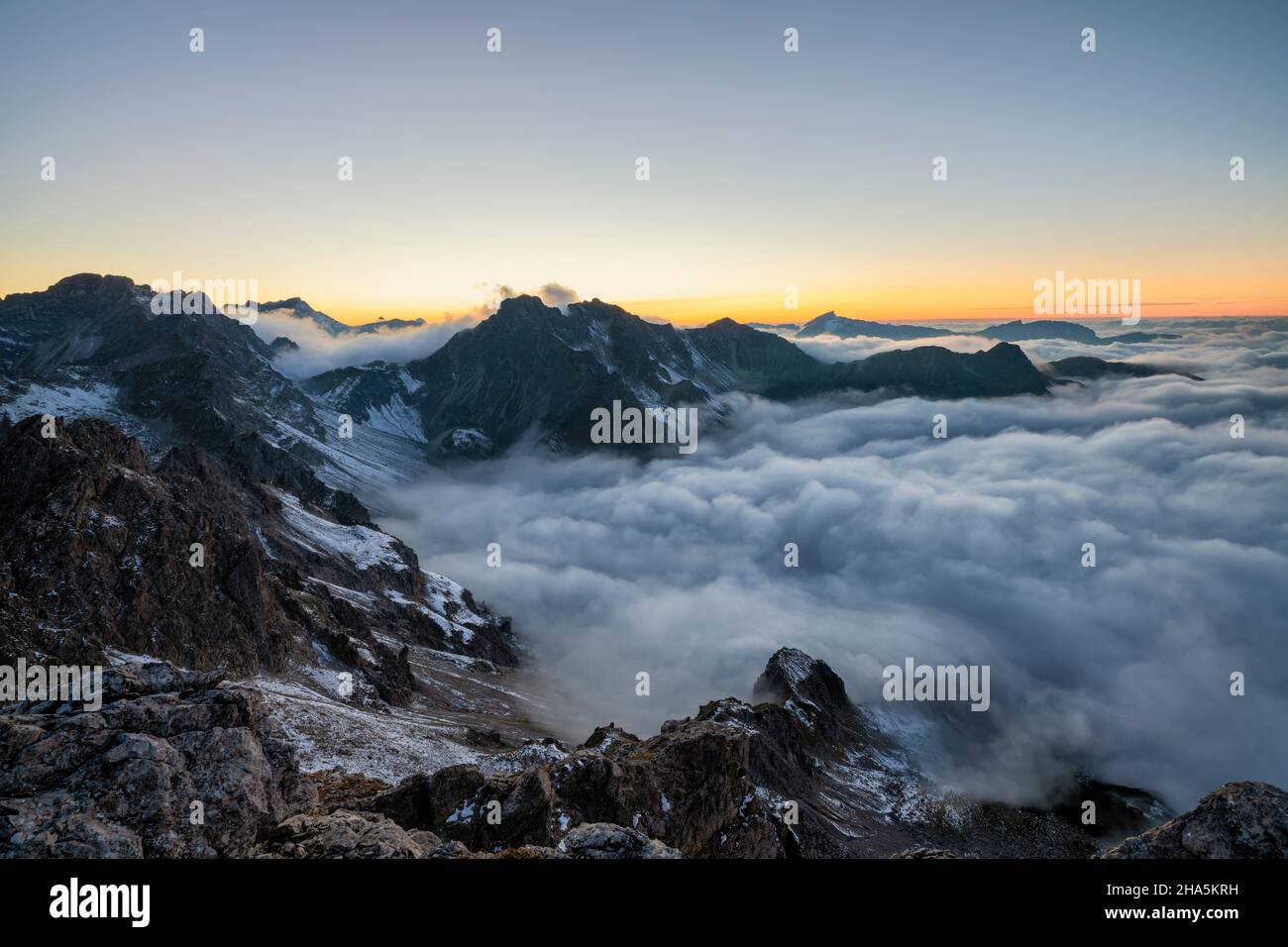 alpine mountain landscape with wild rock mountains after sunset over ...