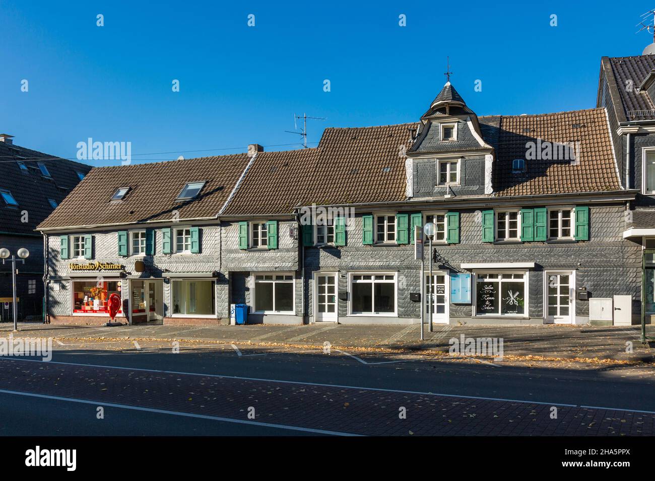 Half timbered houses with slate cladding and green shutters hi-res ...