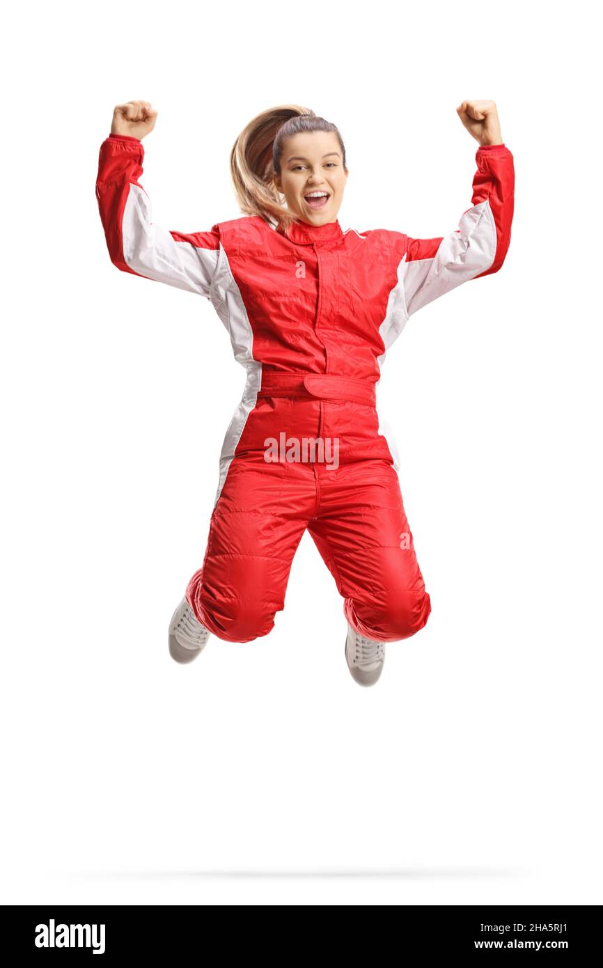 Female racer in a red suit jumping and gesturing happiness isolated on ...