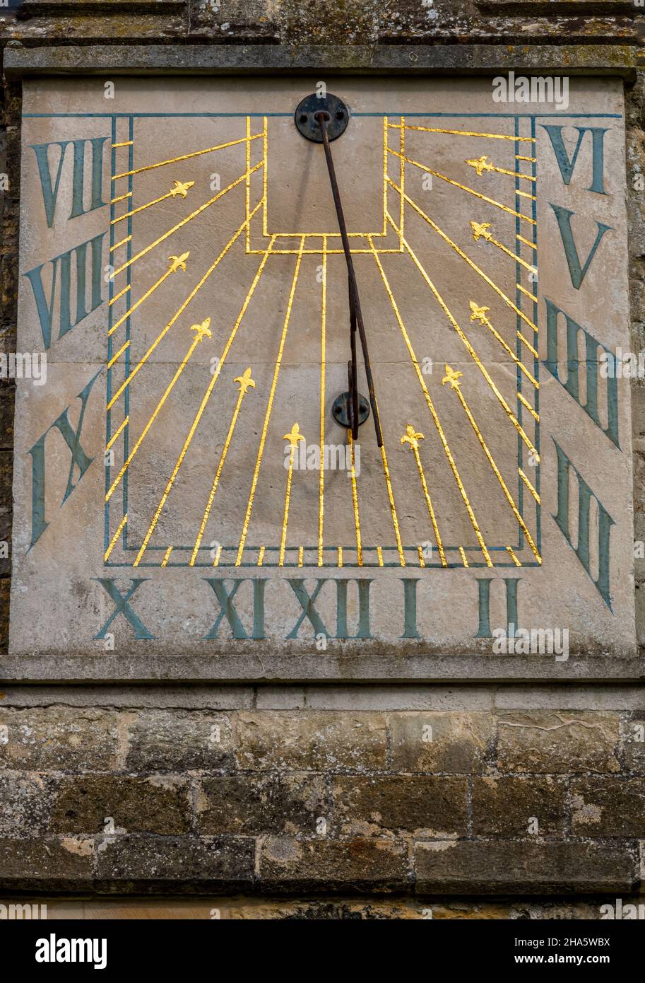 historic sundial on the wall of chichester cathedral in west sussex ...