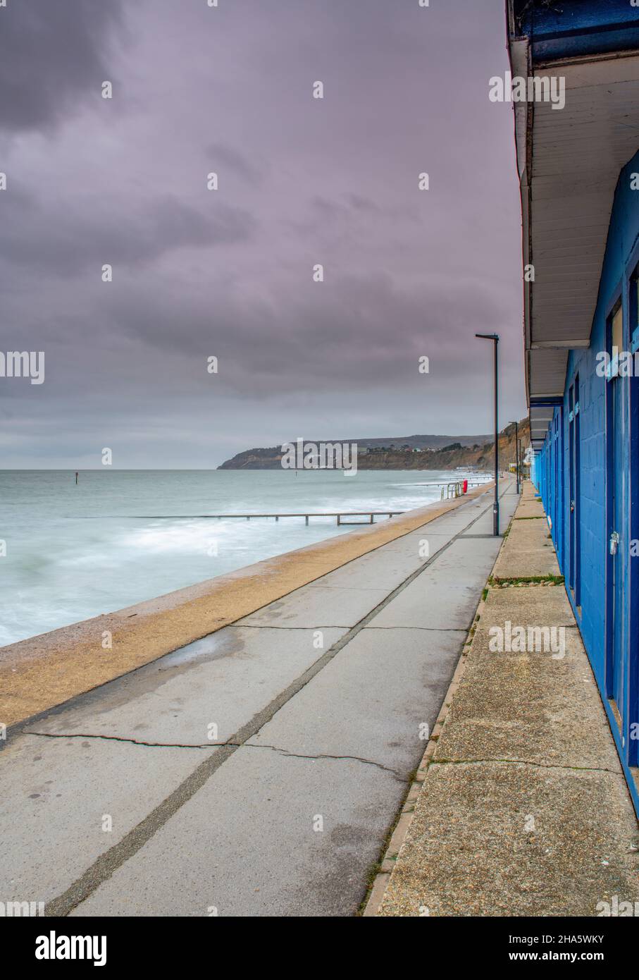 blue beach huts on the coast of the isle of wight shoreline at shanklin ...
