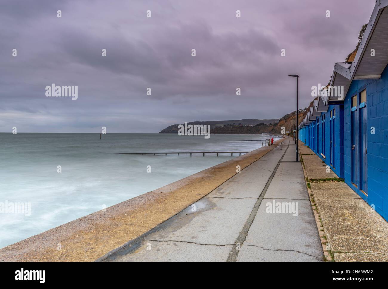 beach huts on isle of wight coastline at shanklin, blue painted beach ...
