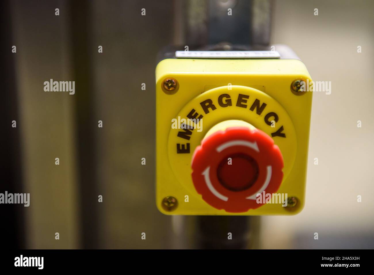 Red emergency stop button close-up Stock Photo - Alamy