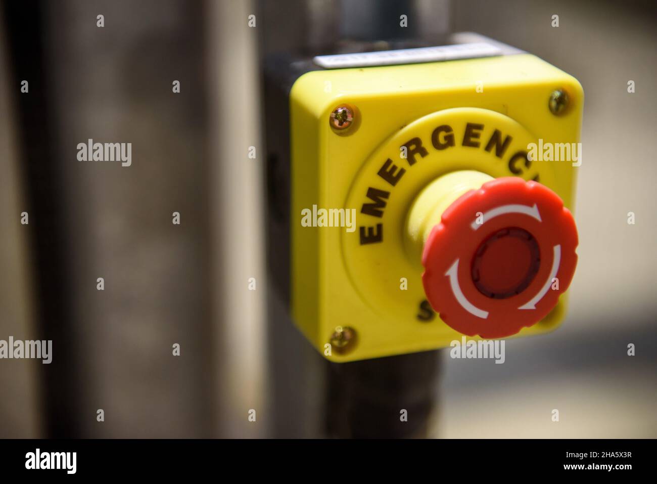 Red emergency stop button close-up Stock Photo - Alamy