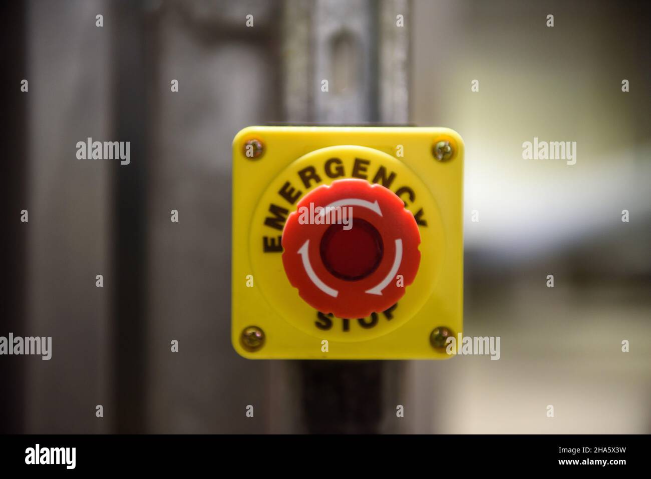 Red emergency stop button close-up Stock Photo - Alamy